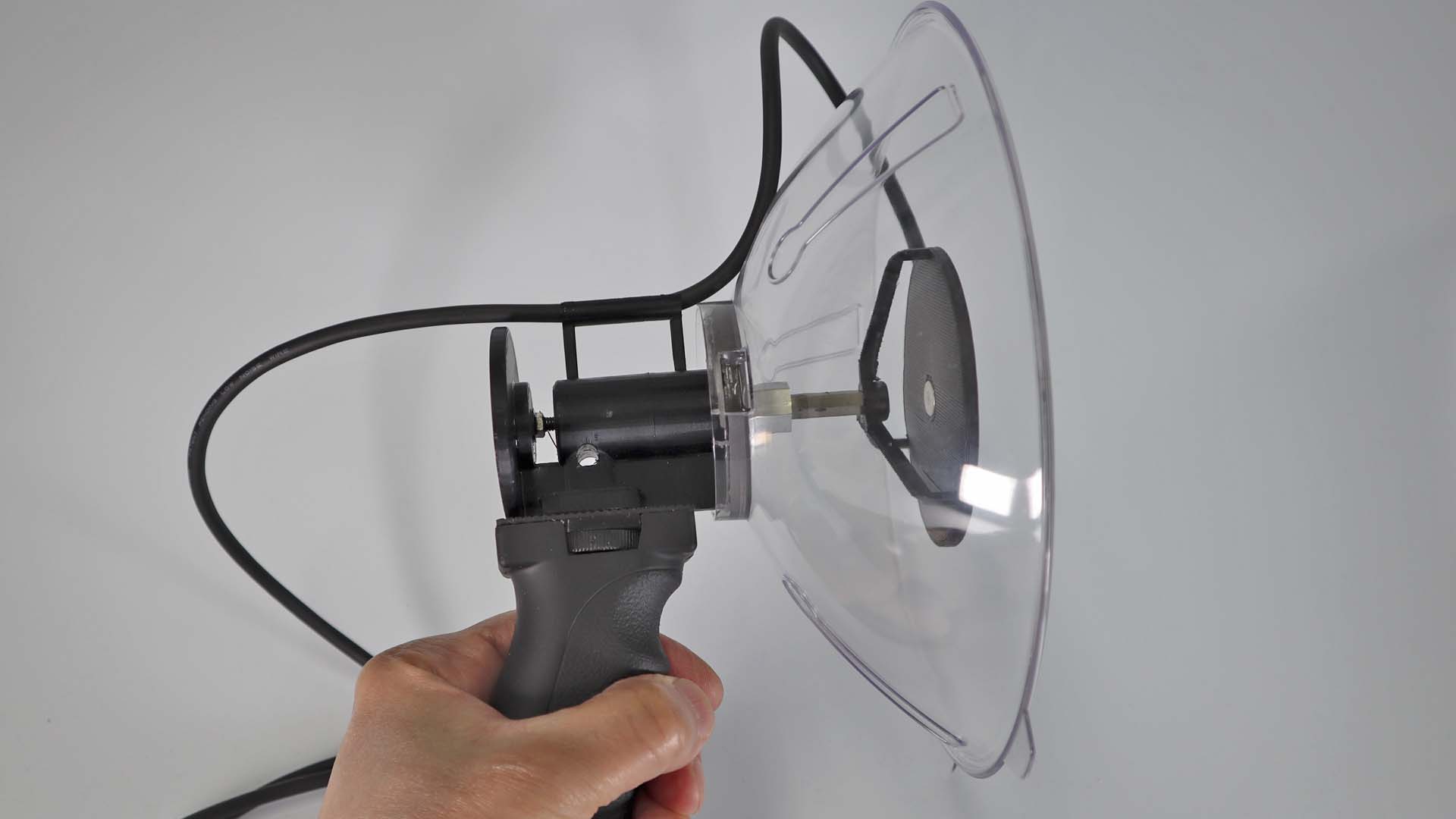 I bought a small parabolic microphone for just 40 dollars off the web ...